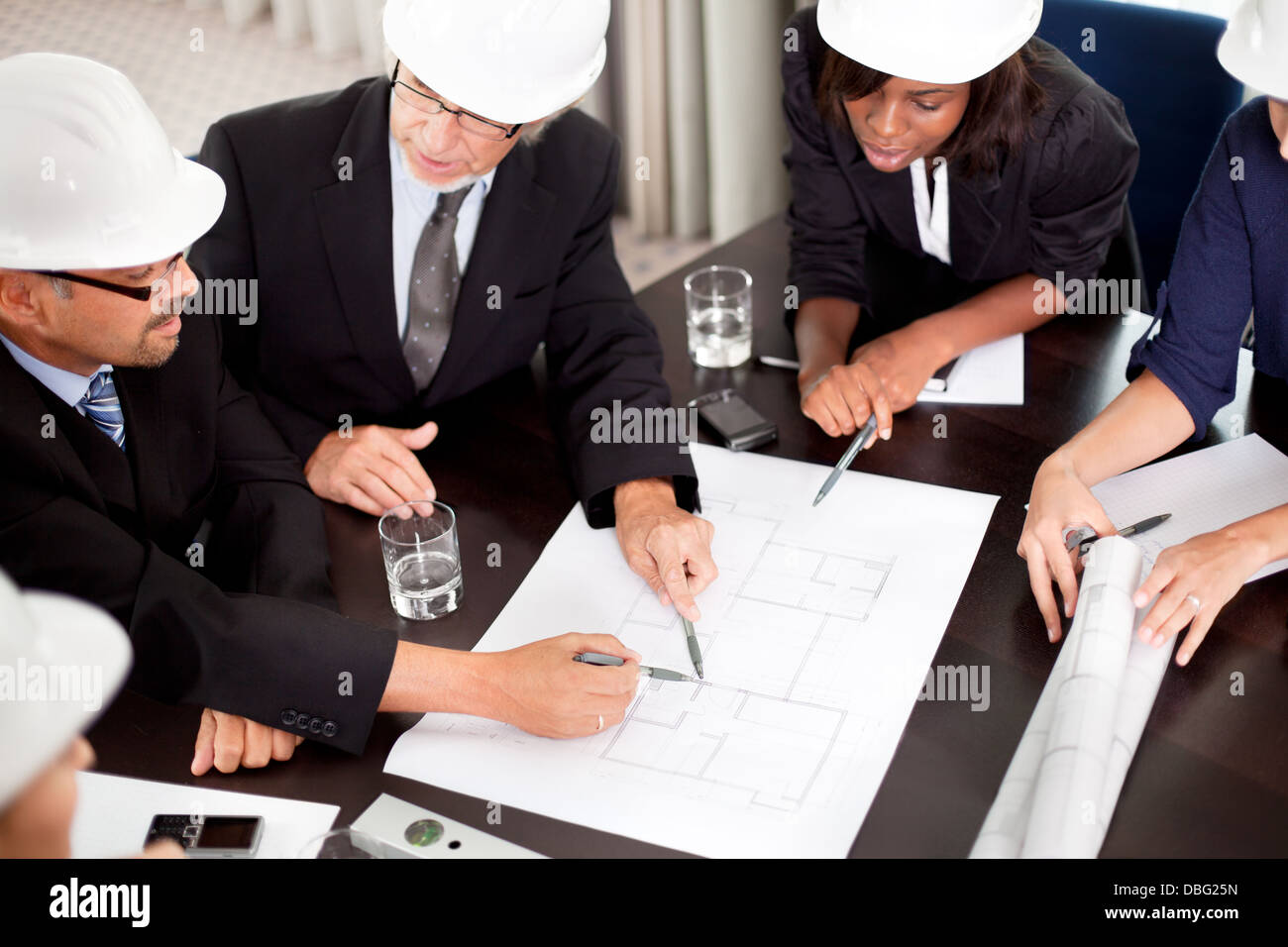 Engineers discussing about a new project Stock Photo - Alamy
