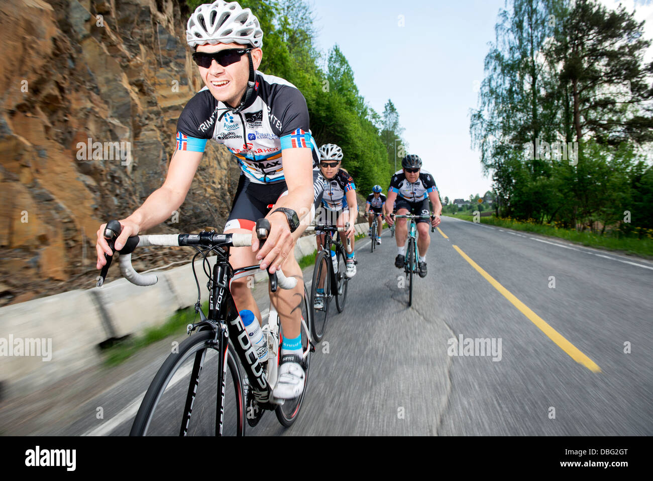 A team of cyclists racing Stock Photo - Alamy