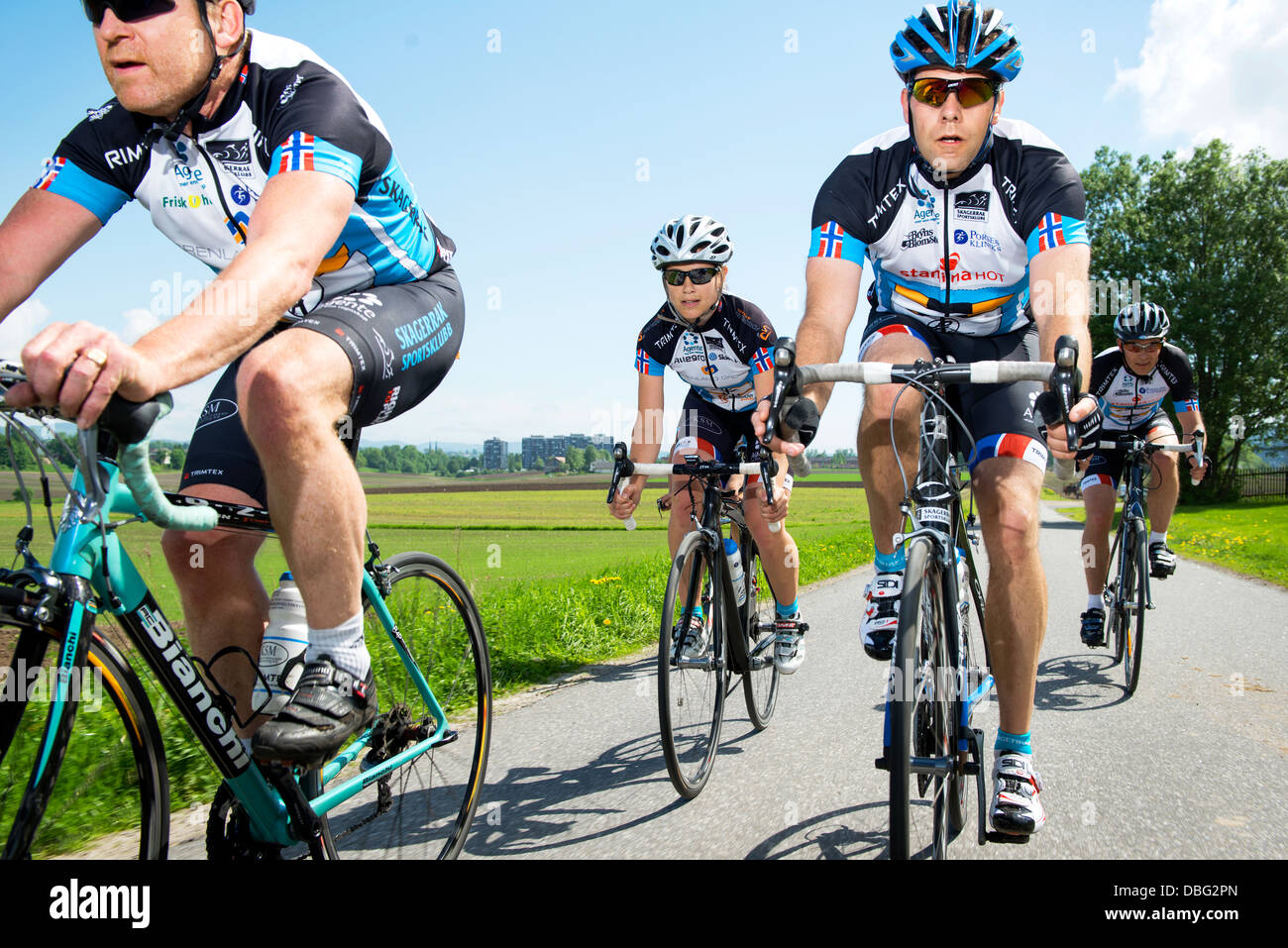 A team of cyclists racing Stock Photo - Alamy