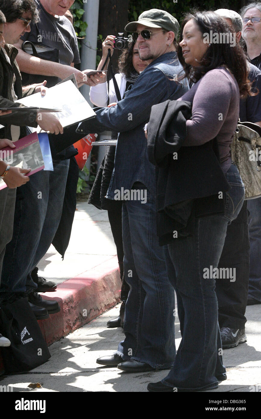 U2 frontman Bono signs autographs for fans outside the Chateau Marmont ...