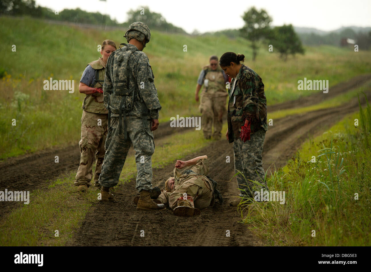 A U.S. Army Soldier renders aid to victims of a simulated mass ...