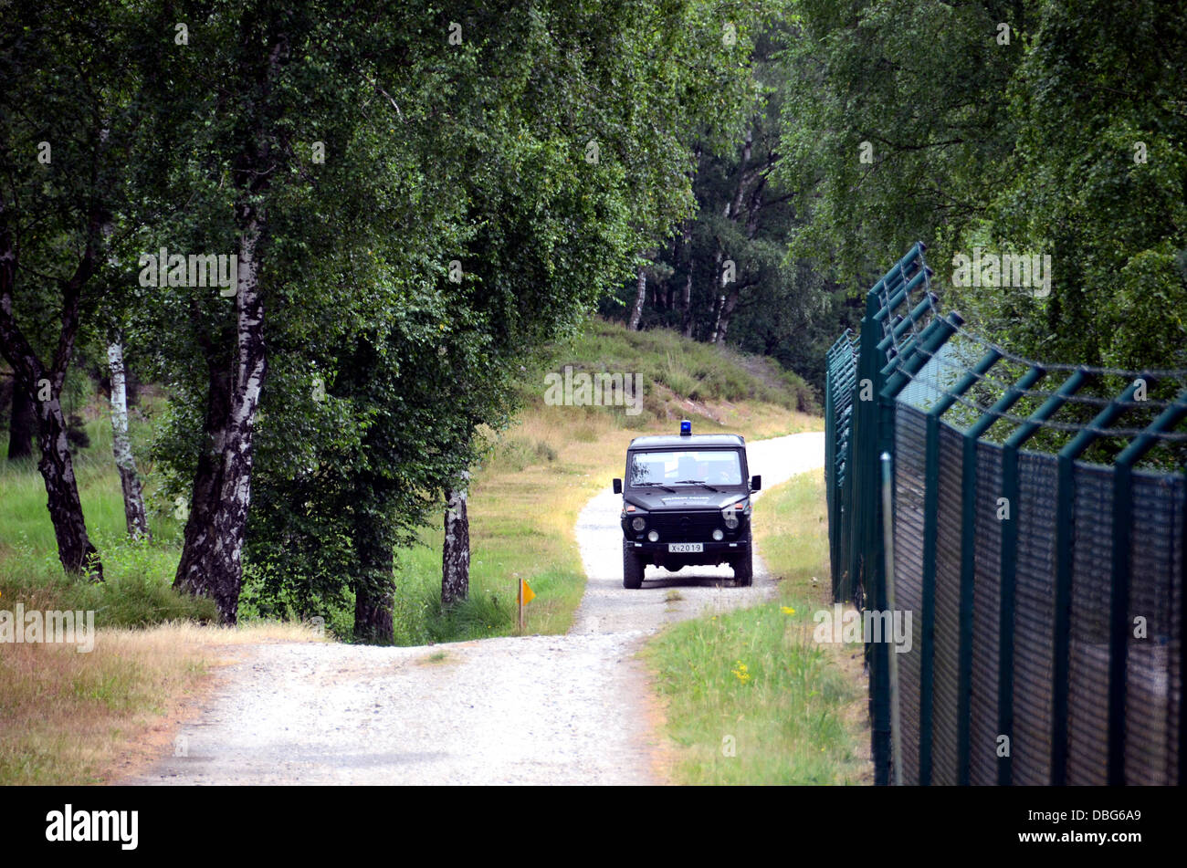 A member of the E-3A Component performs a perimeter check July, 26 ...