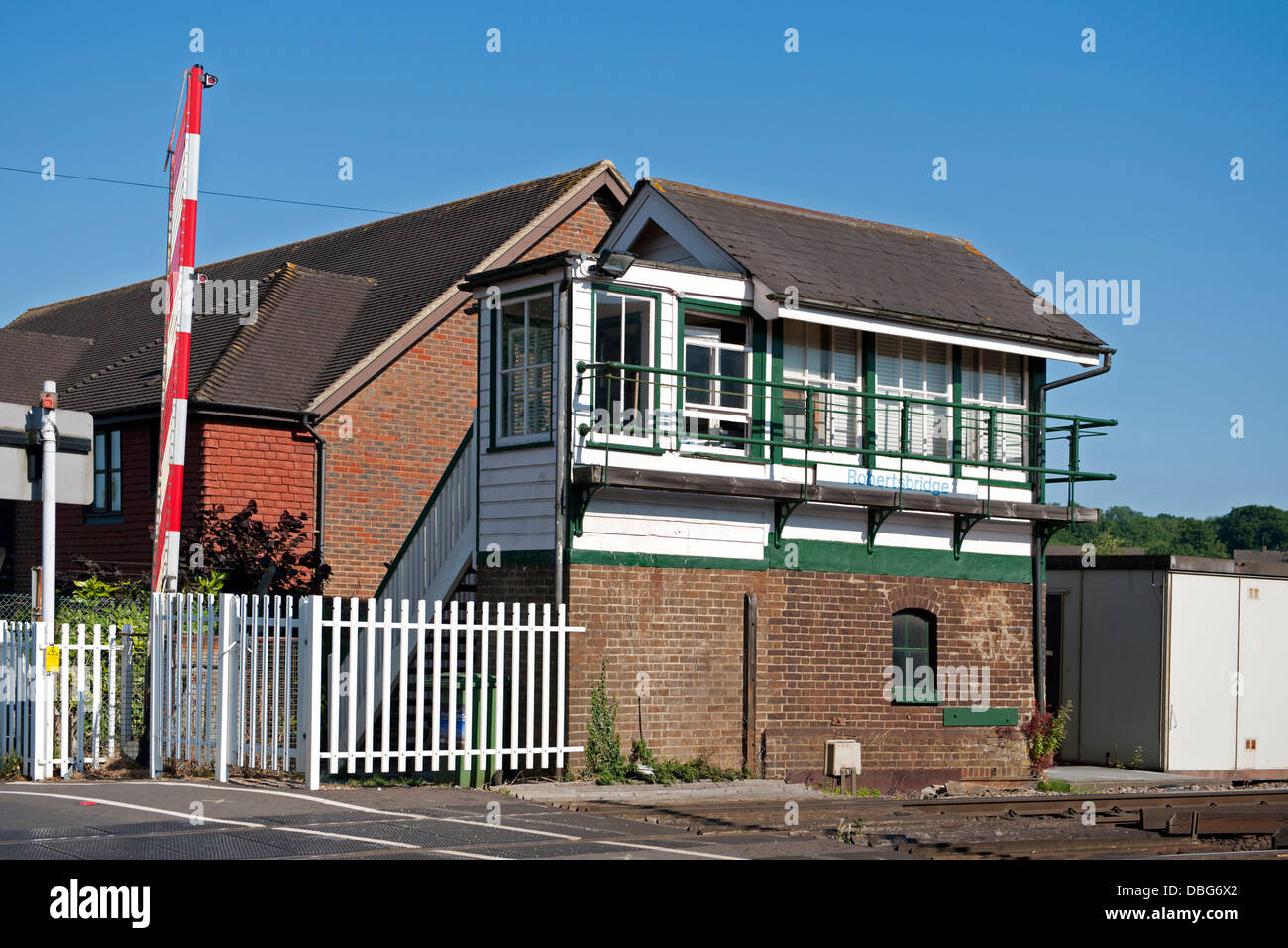 Robertsbridge railway signalbox and road crossing, East Sussex, UK ...