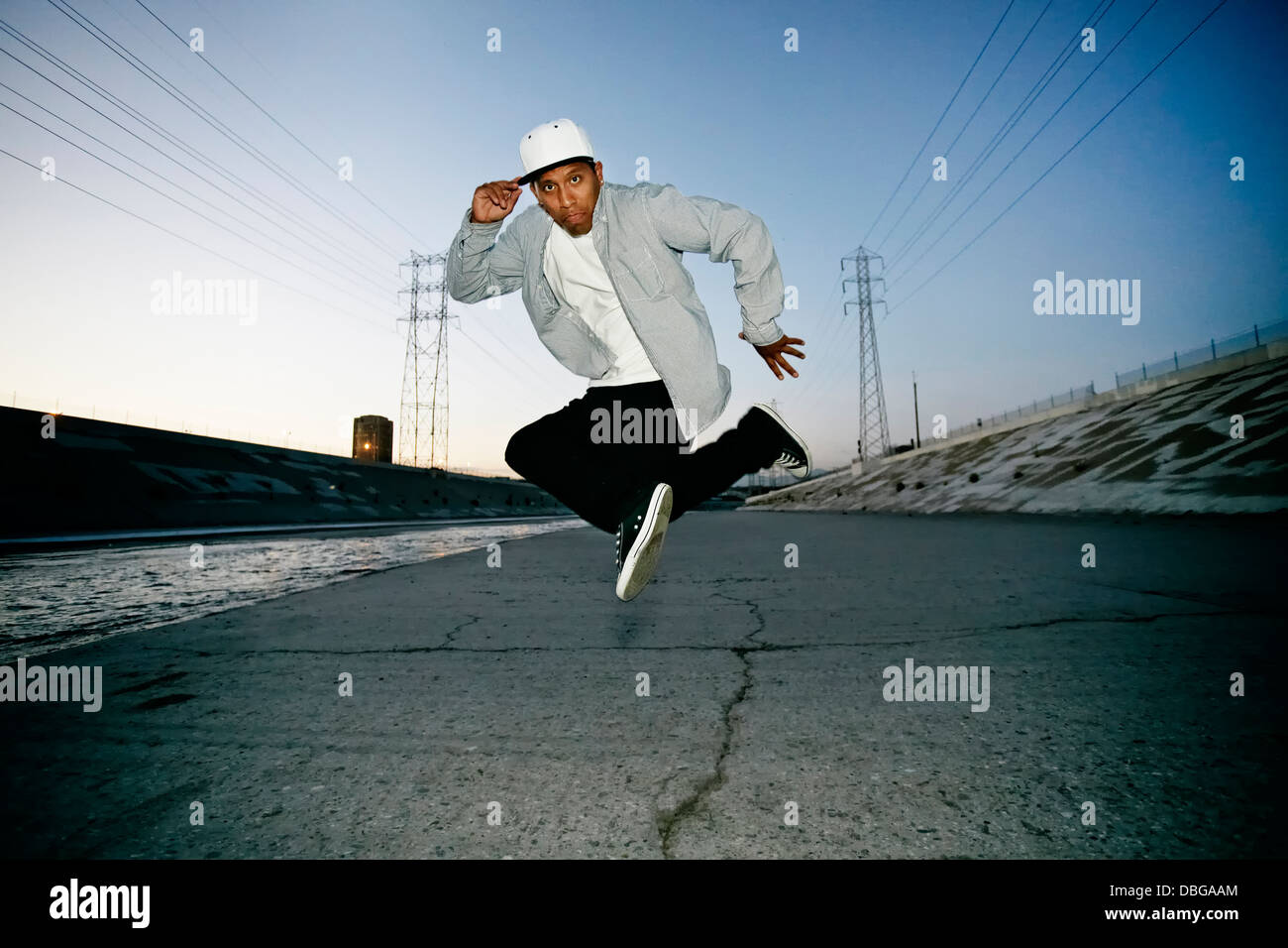 Hispanic man dancing on urban street Stock Photo - Alamy