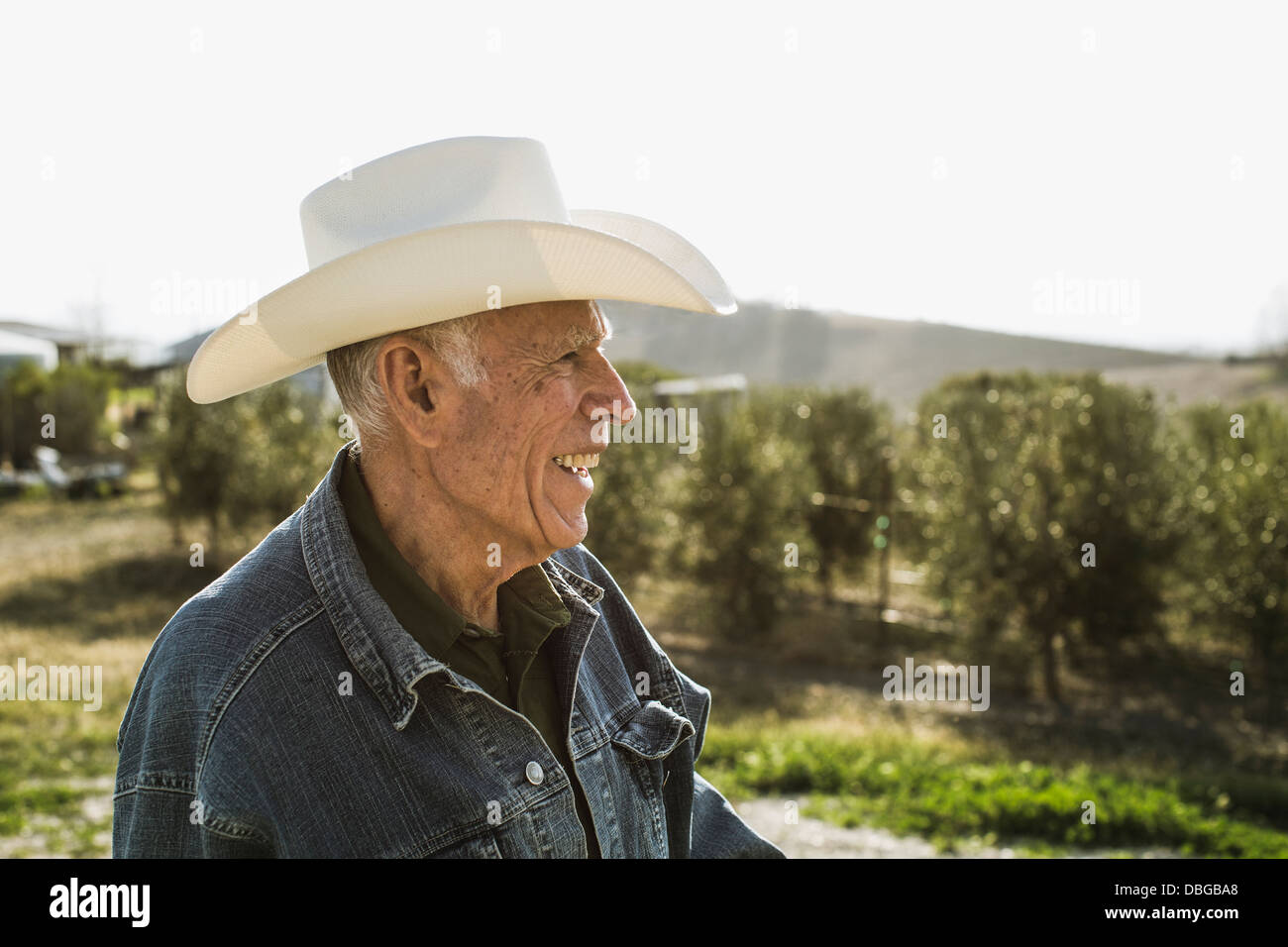 Hispanic farmer smiling in vineyard Stock Photo - Alamy