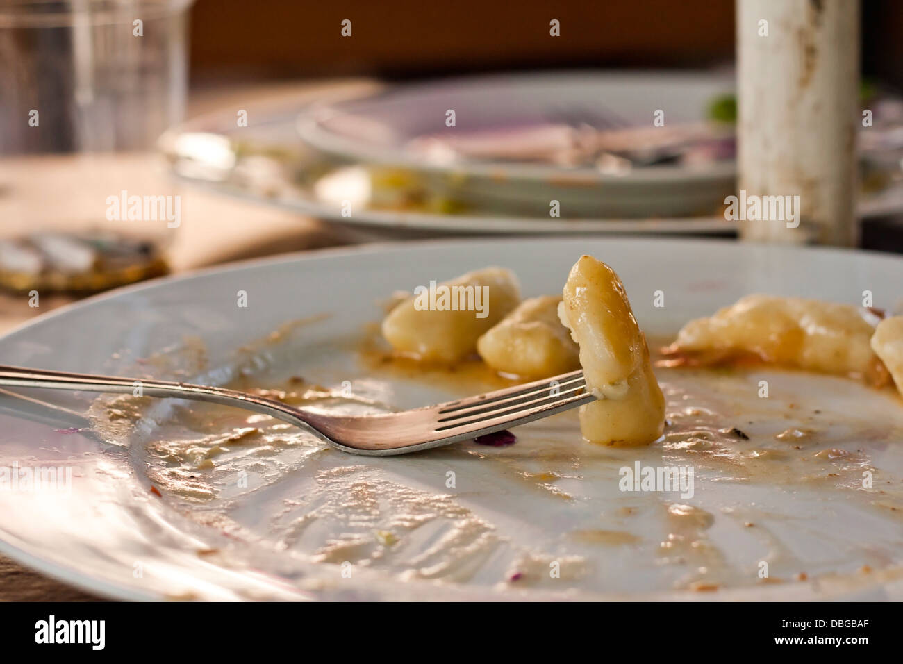 Unfinished crappy food in restaurant Stock Photo - Alamy