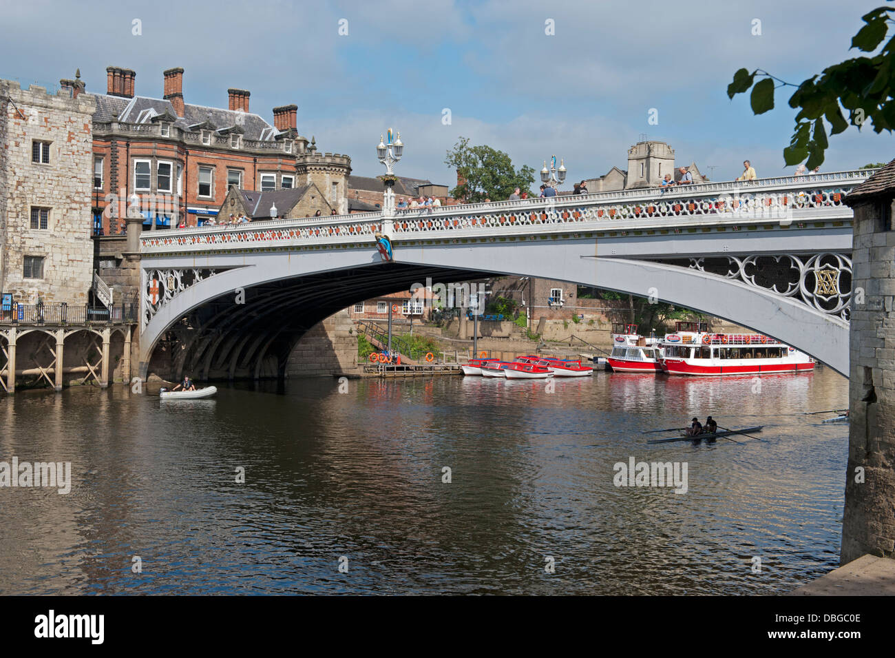 Lendal Bridge, York, UK with some rowers from a nearby rowing club ...