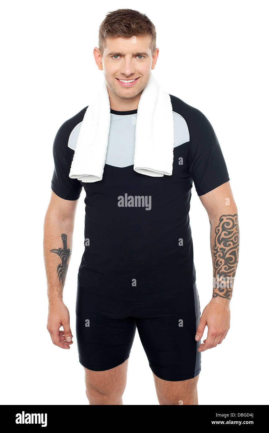 Young fit guy posing after gym workout Stock Photo - Alamy