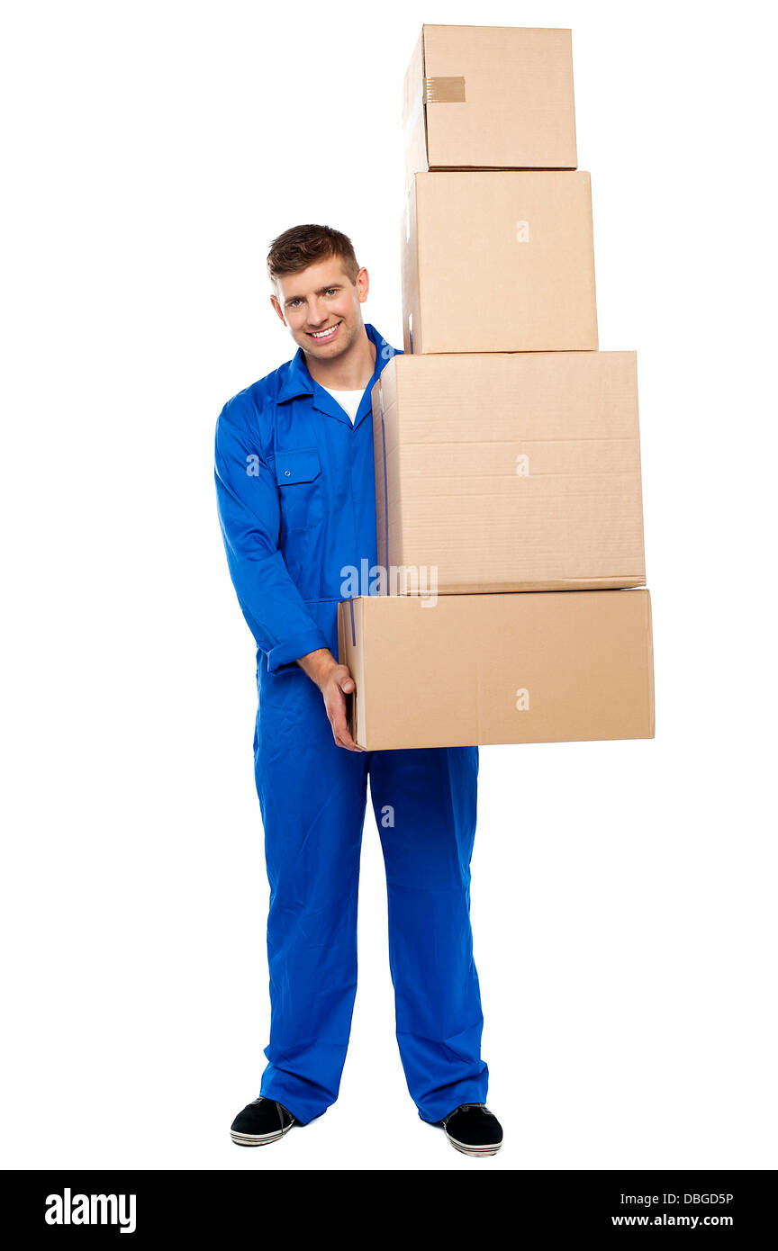 Delivery guy holding pile of cardboard boxes Stock Photo - Alamy