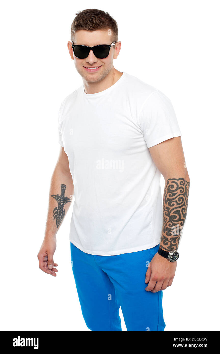 Handsome guy wearing shades and posing Stock Photo - Alamy