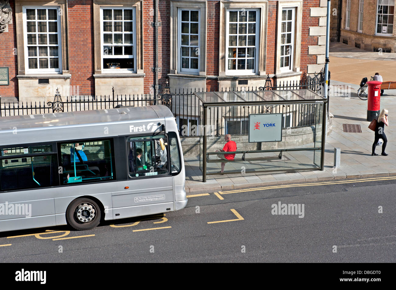 A bus stationary at a stop in Station Road, York, UK Stock Photo - Alamy