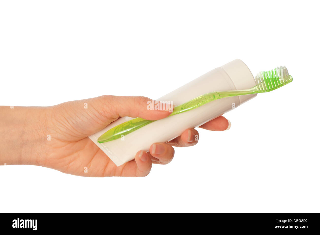 Toothpaste and green toothbrush Stock Photo - Alamy