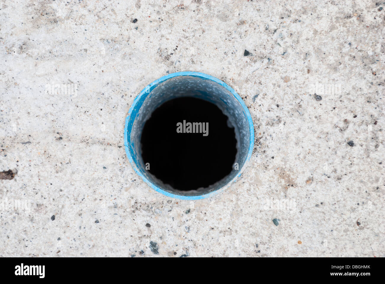 Hole of PVC on Concrete Floor Stock Photo - Alamy
