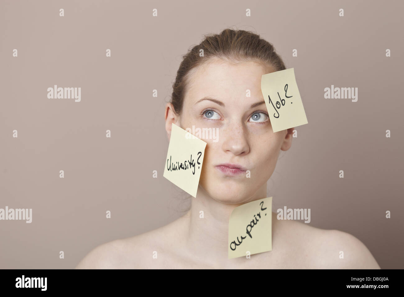 Young woman with different note it's in her face Stock Photo - Alamy