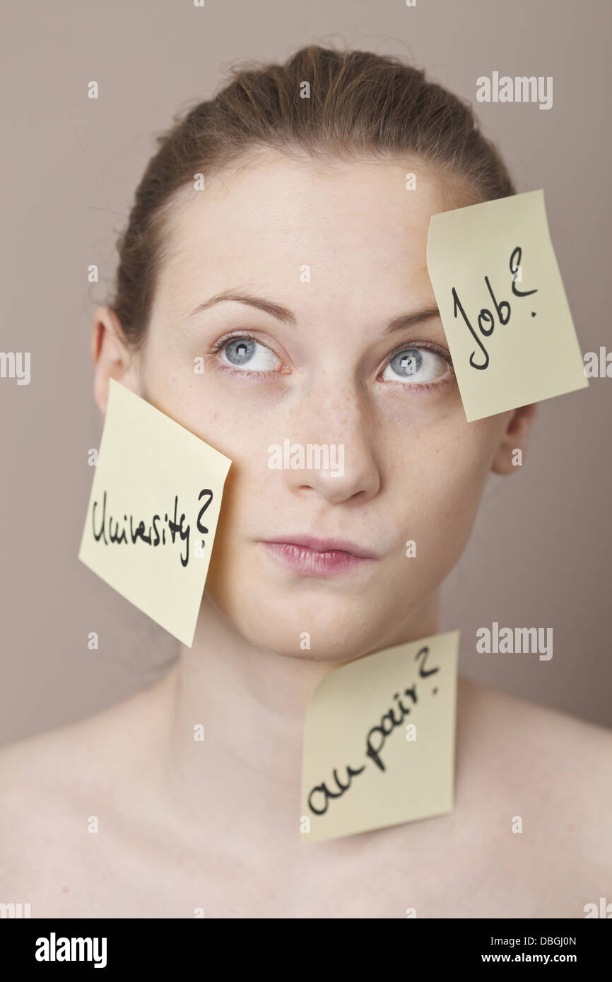 Young woman with different note it's in her face Stock Photo - Alamy