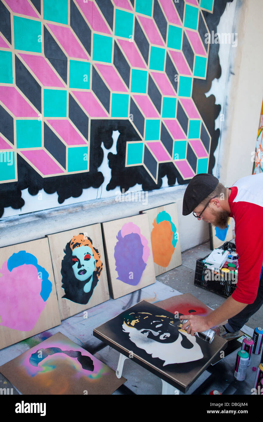 artist Cory Anglin, Artists Making A Street Scene mural, The Funk Zone ...