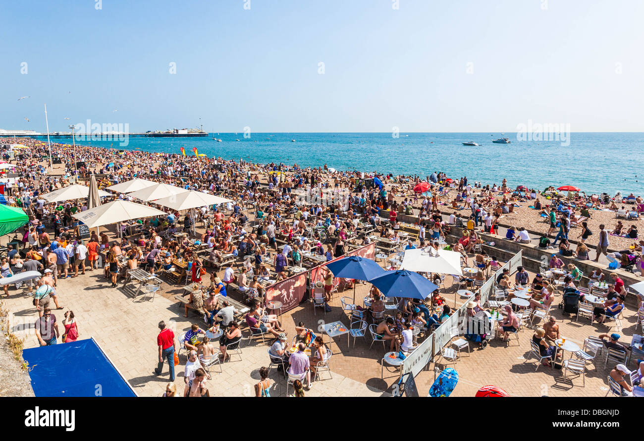 Busy beach, Brighton, England, UK Stock Photo - Alamy