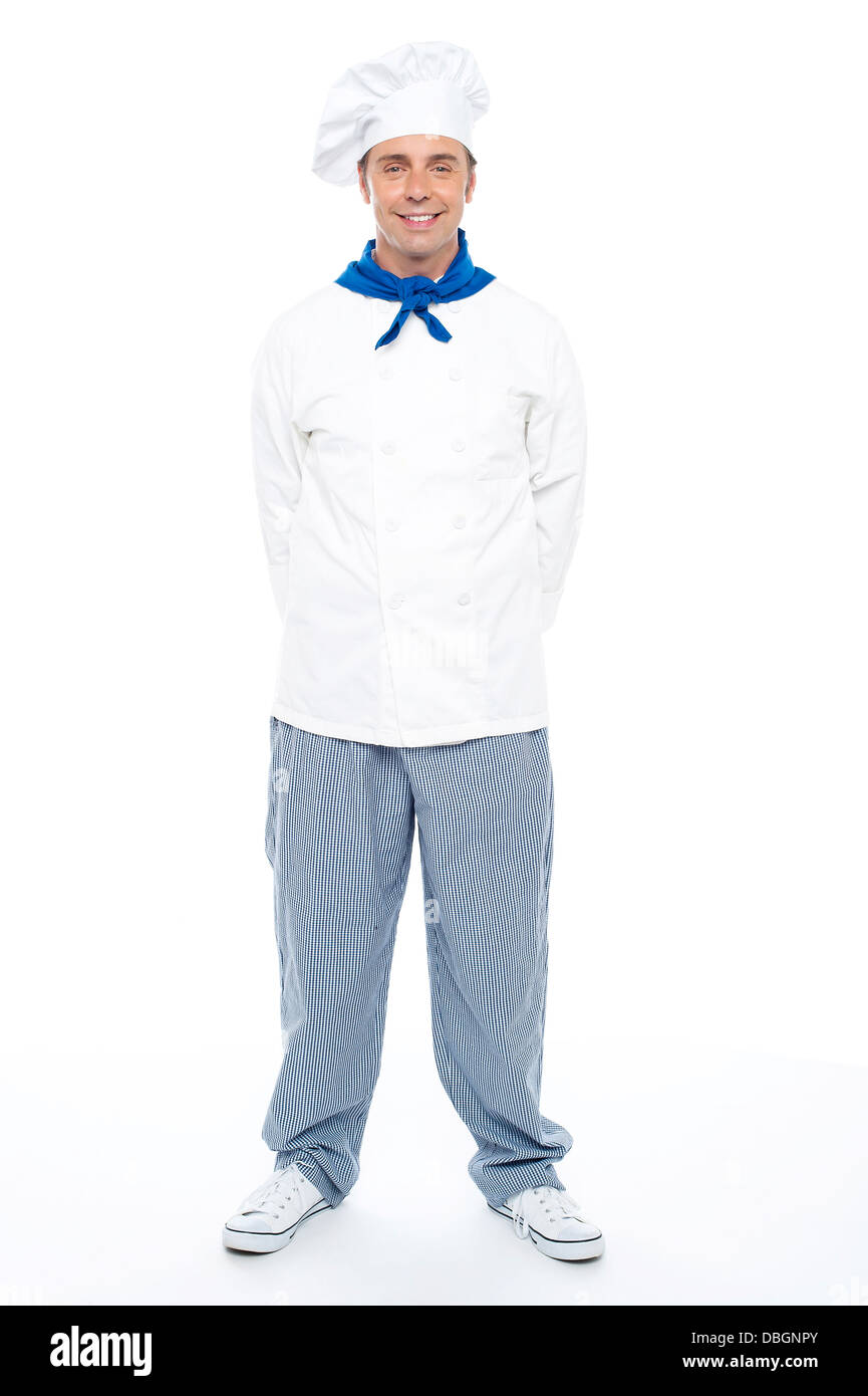 Smart young smiling male chef posing casually Stock Photo - Alamy