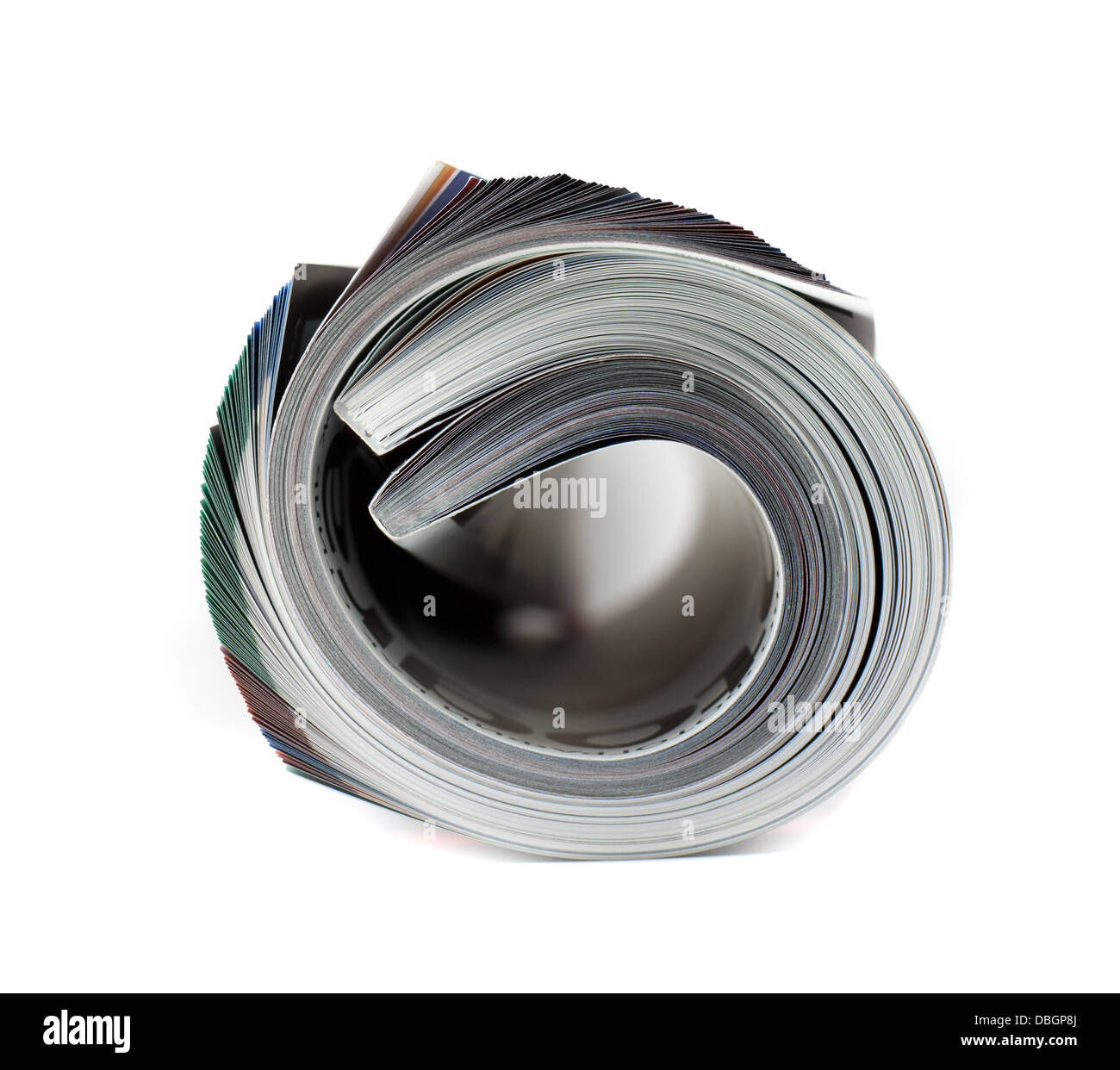 Rolled magazine on white Stock Photo - Alamy