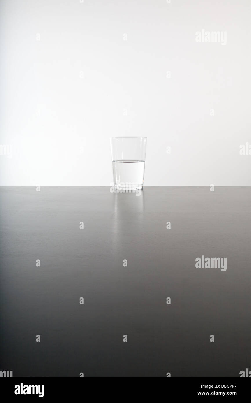 glass half full or empty Stock Photo - Alamy