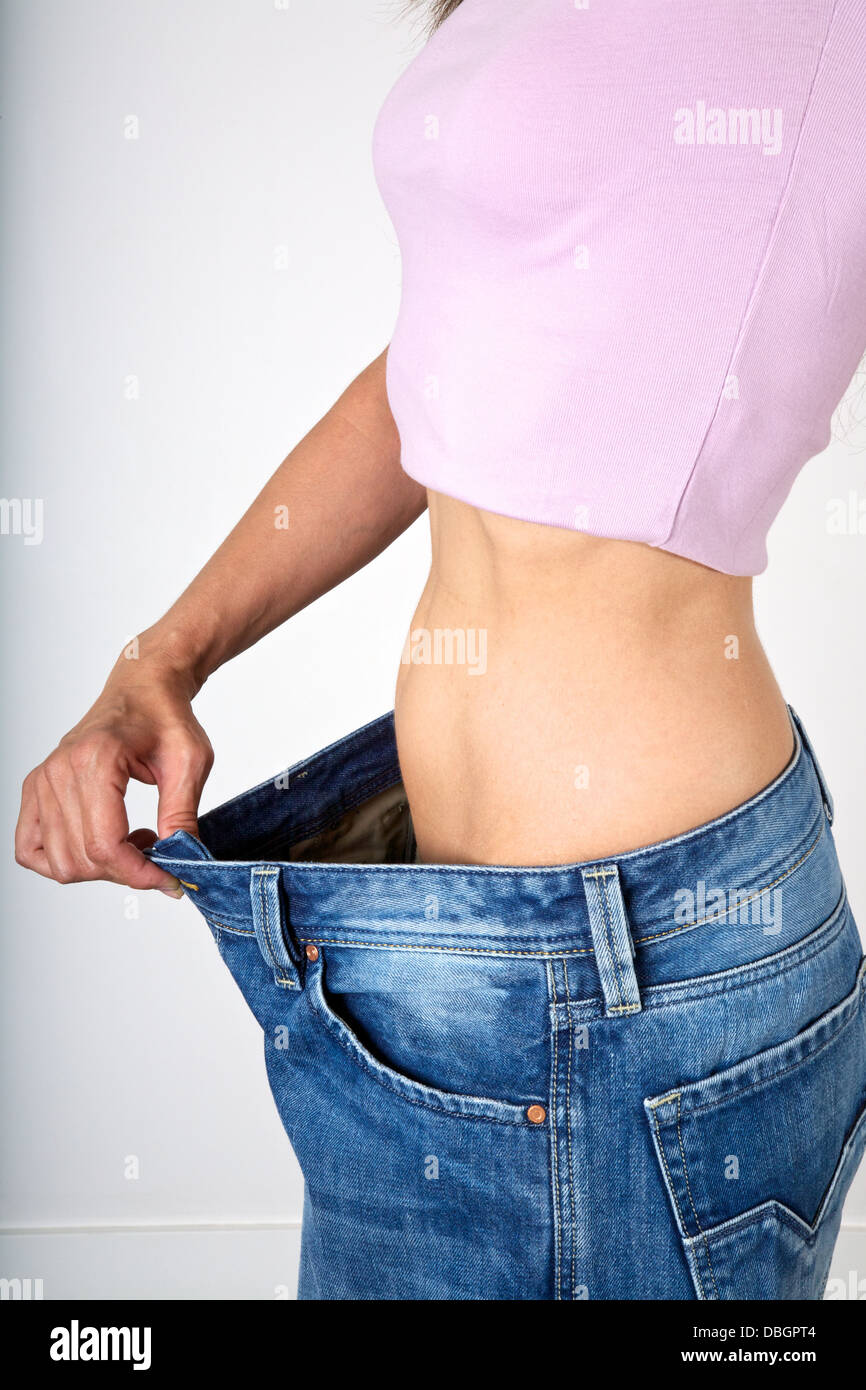 Belly button showing hi-res stock photography and images - Alamy