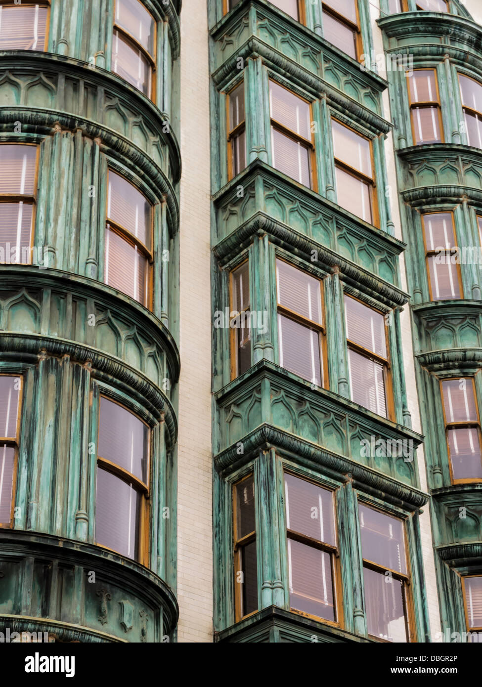 Pattern of row of vertical rows of windows in San Francisco apartment ...