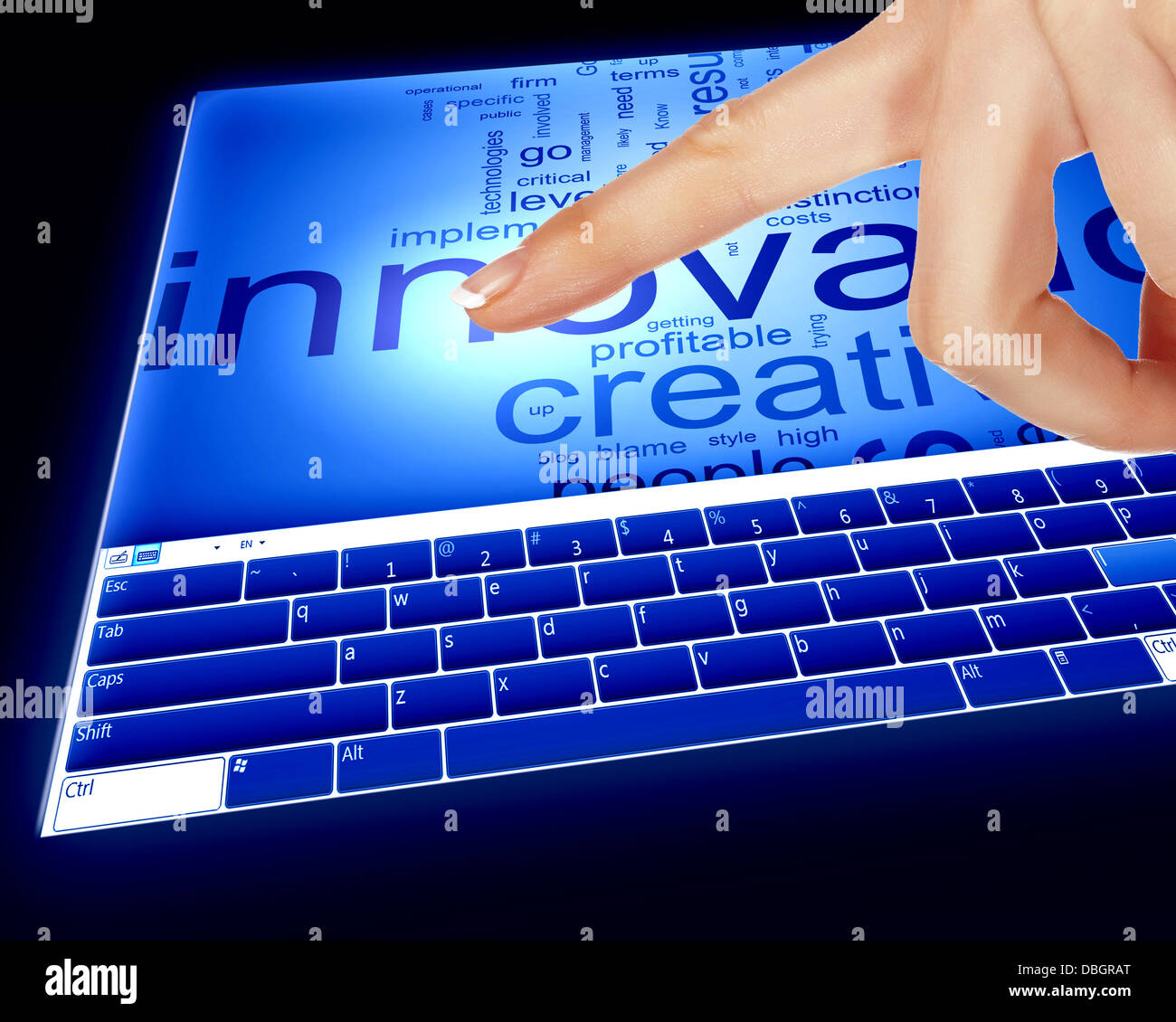 Finger touching a blue computer screen Stock Photo - Alamy
