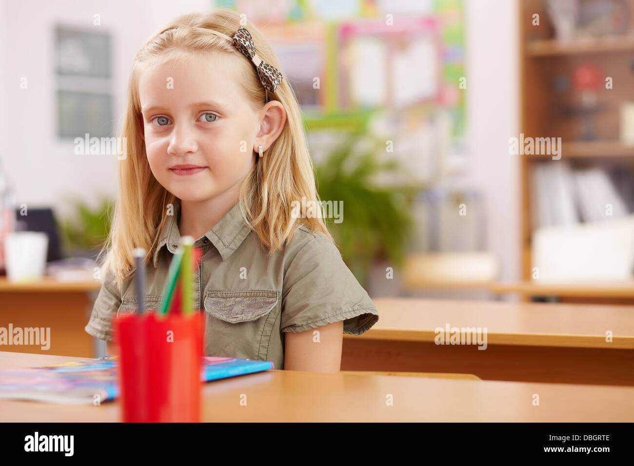 Little girl at school class Stock Photo - Alamy
