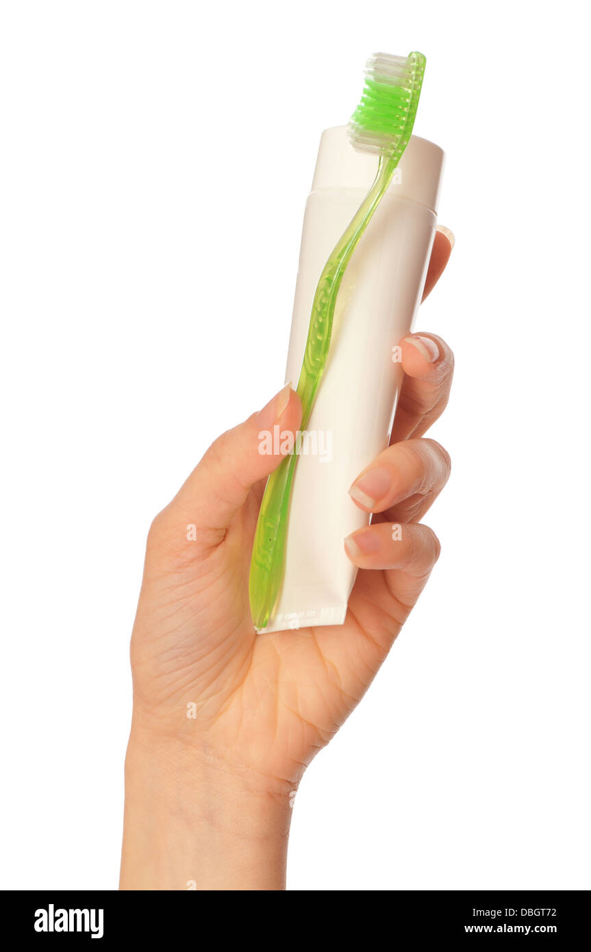 Toothpaste and green toothbrush Stock Photo - Alamy