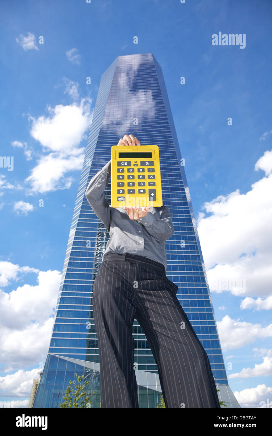 calculator and skyscraper Stock Photo - Alamy