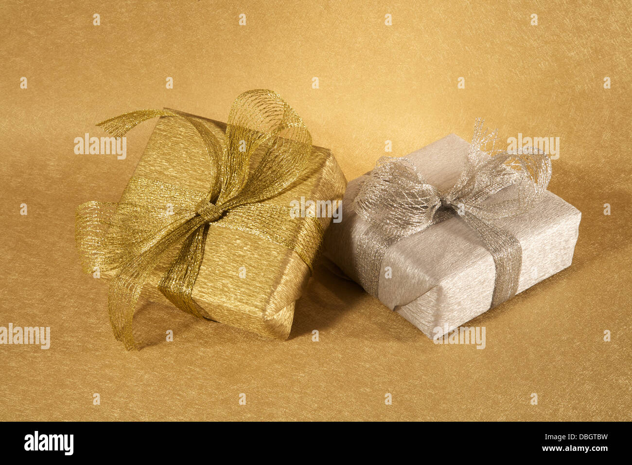 golden and silver gift boxes Stock Photo - Alamy