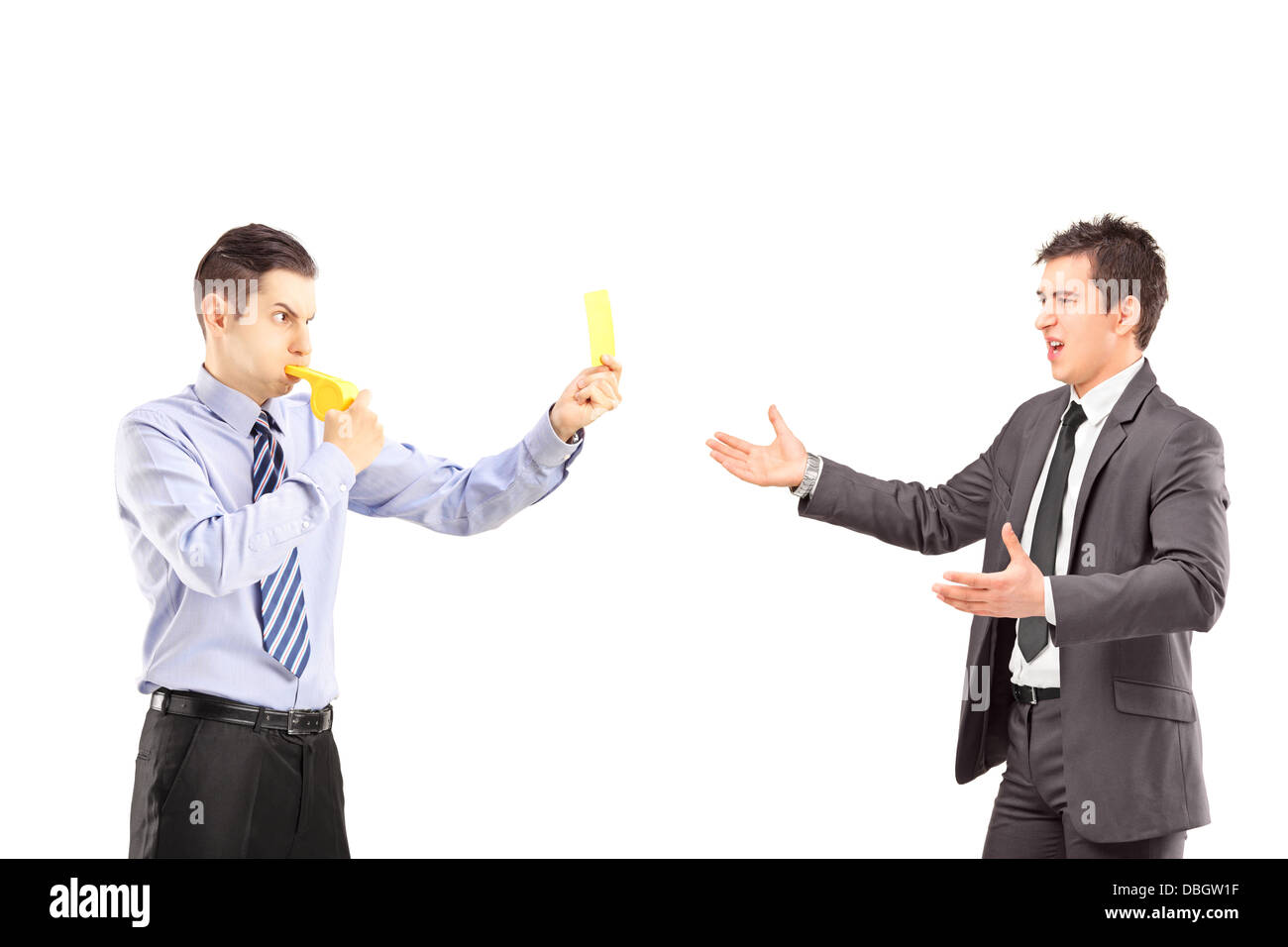 Guy showing a yellow card and blowing a whistle to a young businessman ...