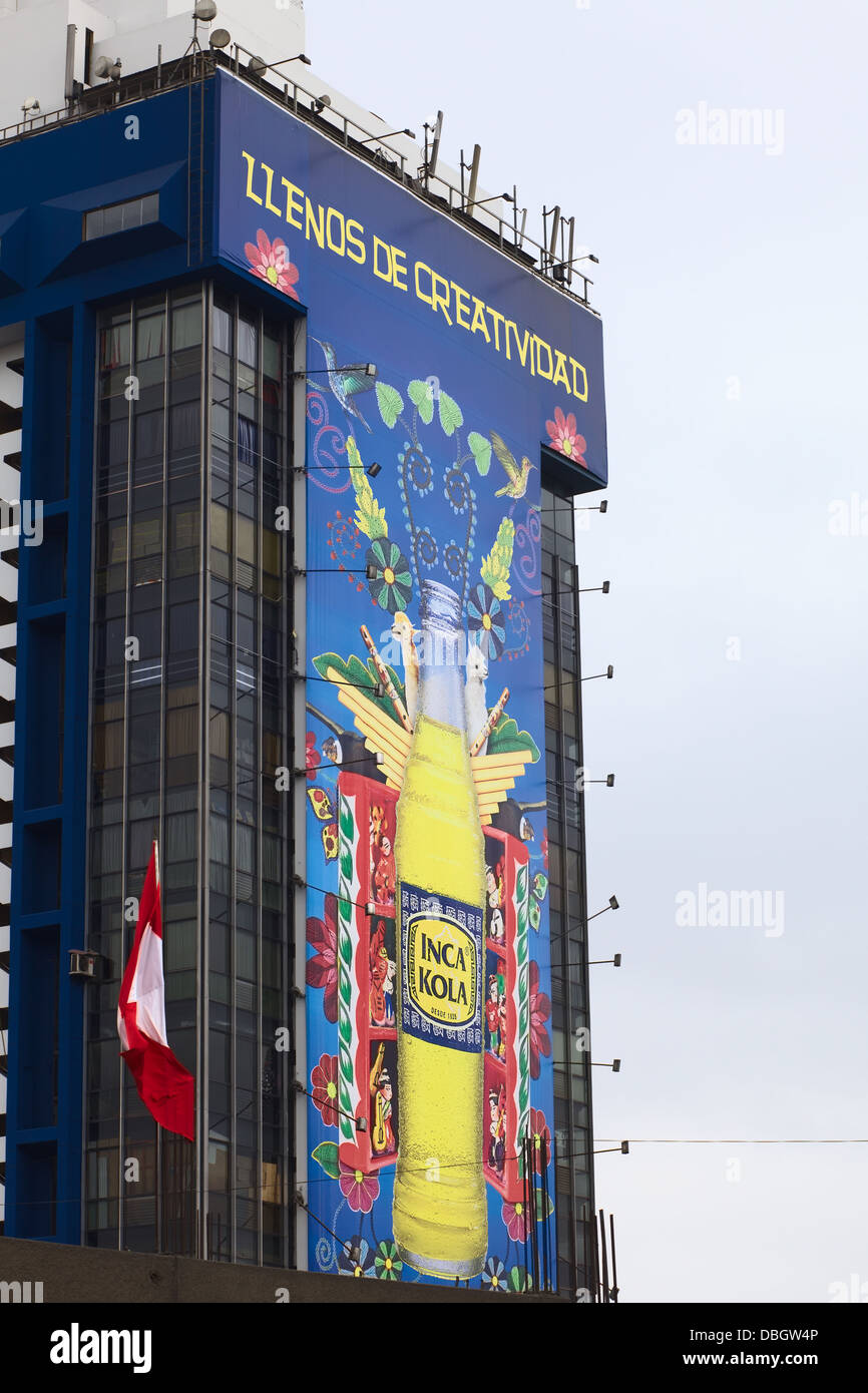 Advertisement of the popular Peruvian soft drink, Inca Kola, on a high ...