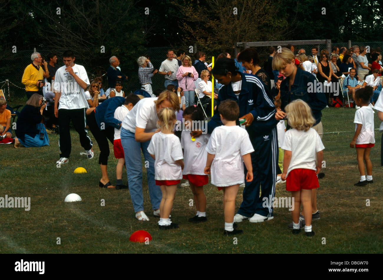 School Sports Day Primary School Teenagers Helping Awarding The ...