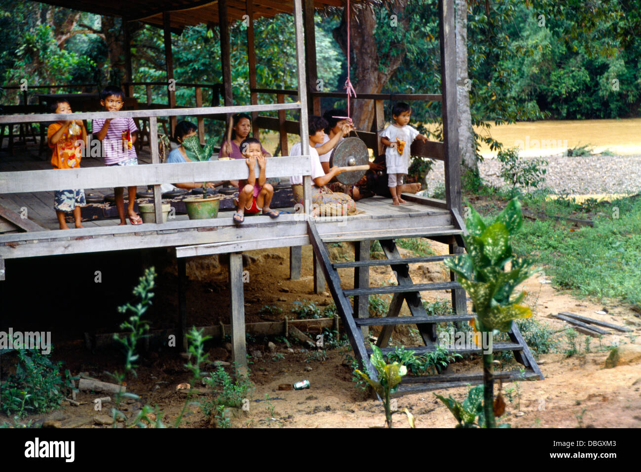 Sarawak Malaysia Borneo Iban People Sitting On The Verandah On A Iban ...