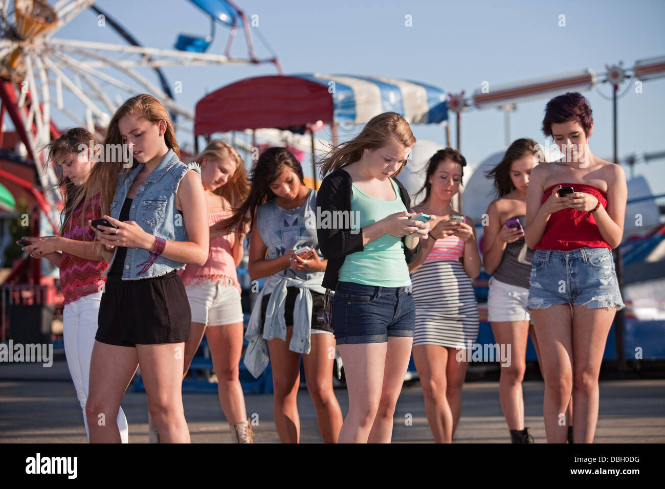 Teen Girls Text Messaging Stock Photo - Alamy