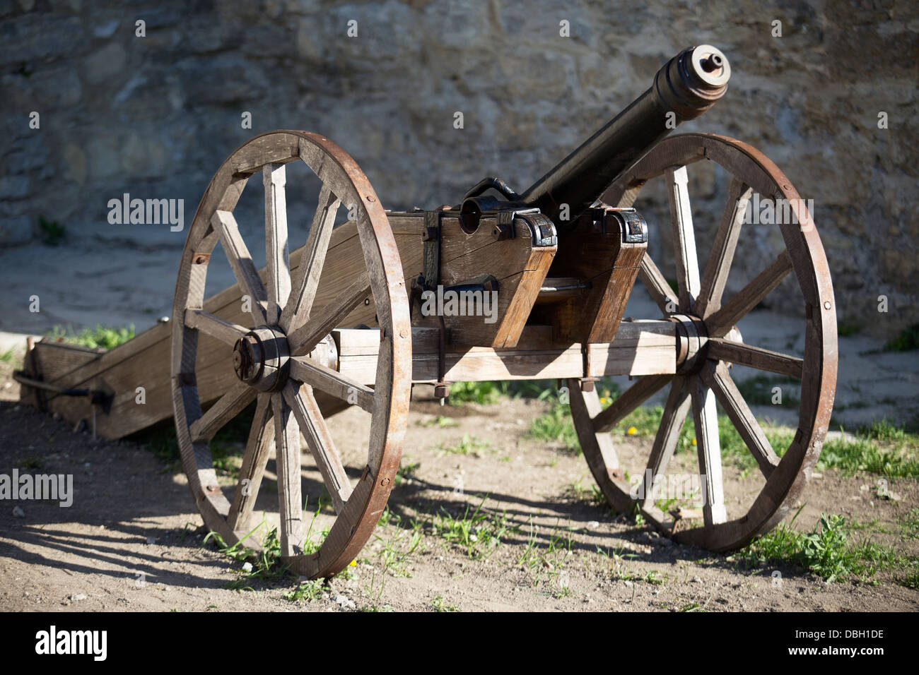 Old medieval artillery canon before a brick wall Stock Photo - Alamy