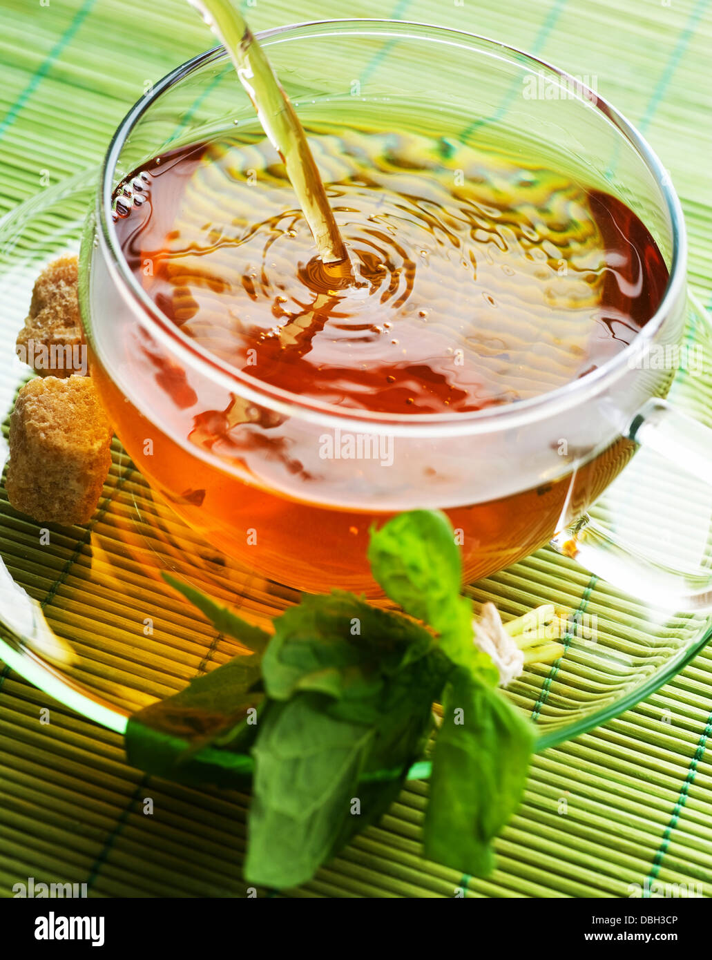 Pouring Healthy Tea Stock Photo - Alamy