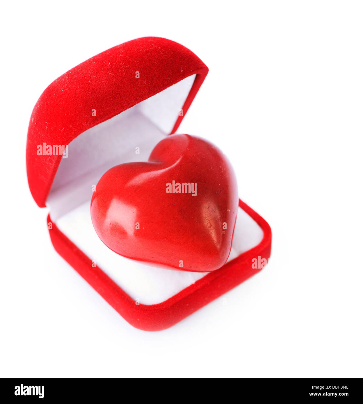 Red velvet Gift Box with a heart on a white background. Valentin Stock ...