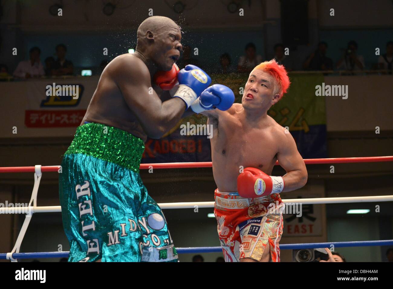 (L-R) Okello Peter (UGA), Kyotaro Fujimoto (JPN), JULY 25, 2013 - Boxing : Kyotaro Fujimoto of ...