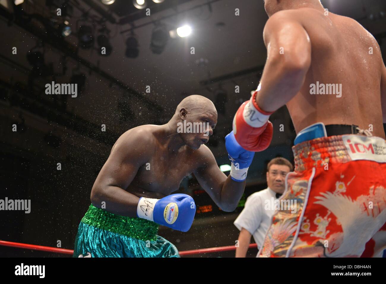 Okello Peter (UGA), JULY 25, 2013 - Boxing : Kyotaro Fujimoto of Japan ...