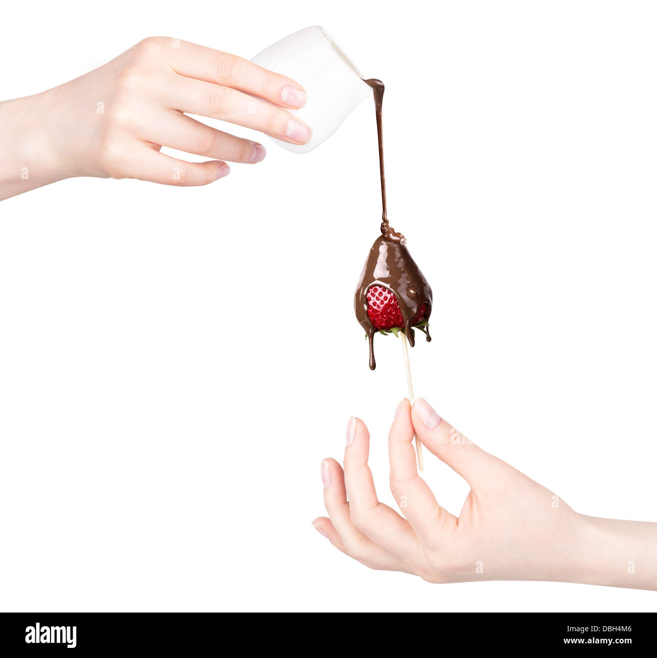 strawberries and chocolate with hand on a white background Stock Photo ...