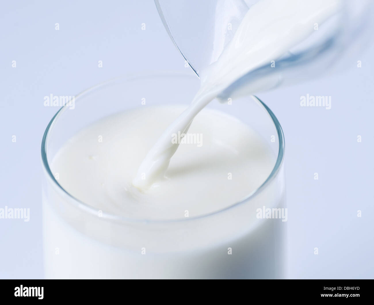 Pouring Healthy Fresh Milk Stock Photo - Alamy