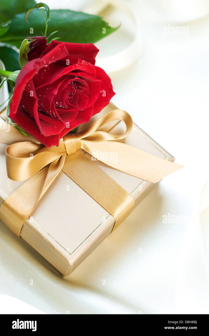 Romantic Gift And Rose Stock Photo - Alamy