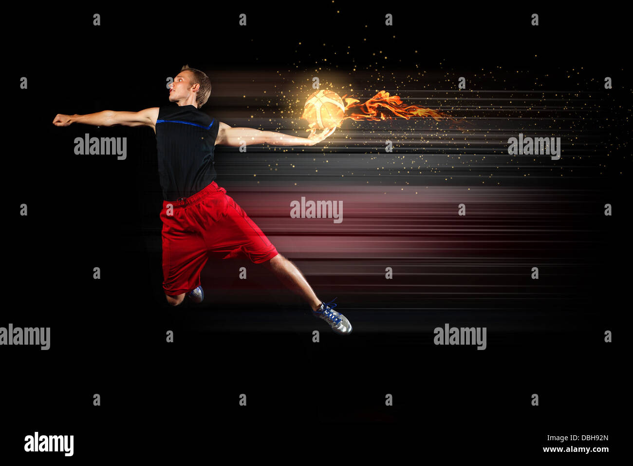 Basketball player with a ball Stock Photo - Alamy