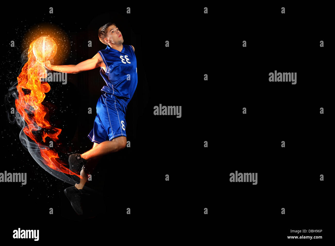 Basketball player with a ball Stock Photo - Alamy