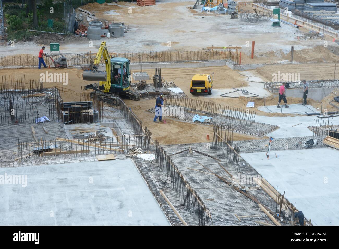 Construction workers work on a construction site in Hamburg, Germany ...
