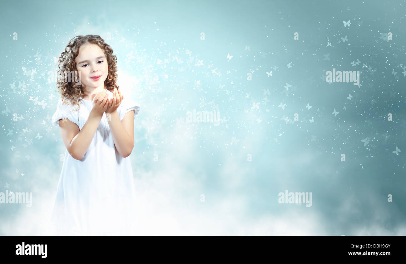 Child with magic light Stock Photo - Alamy