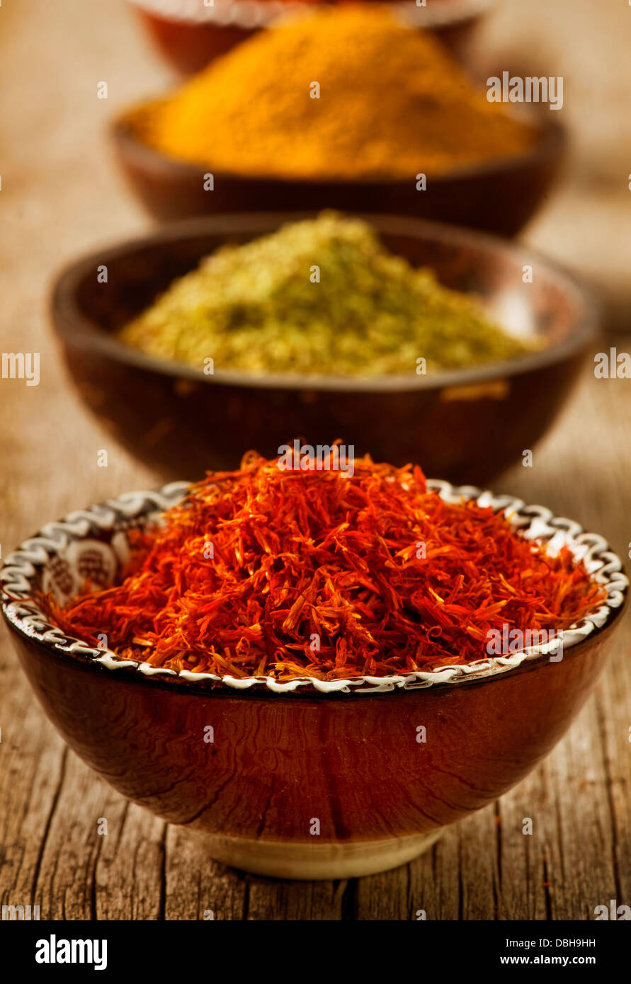 Spices Saffron, turmeric, curry Stock Photo - Alamy