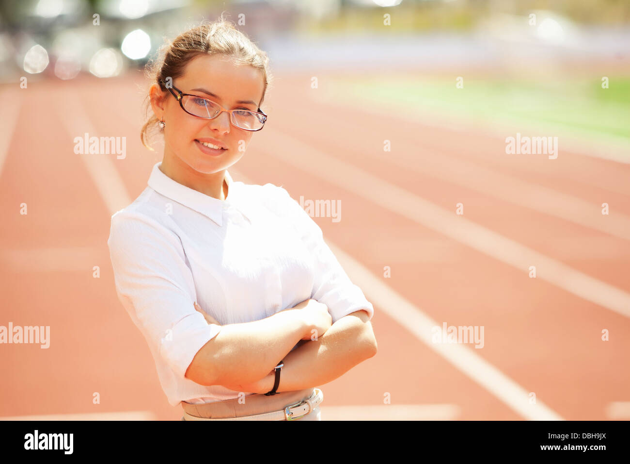 Business woman sport manager at athletic stadium Stock Photo - Alamy